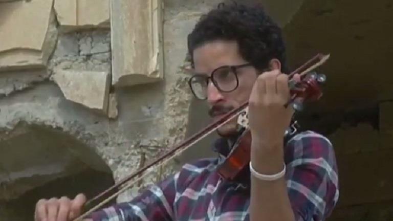 Violinist performs at Mosul shrine - where music was banned under ISIS ...
