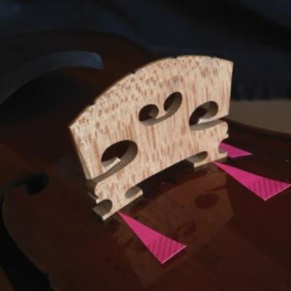 Trade Secrets: Designing a bridge for a violin with distorted arching ...