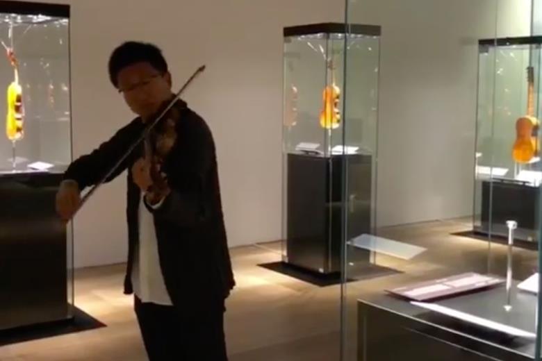 Dan Zhu plays the 1714 'Da Vinci' Stradivarius surrounded by 20 other ...